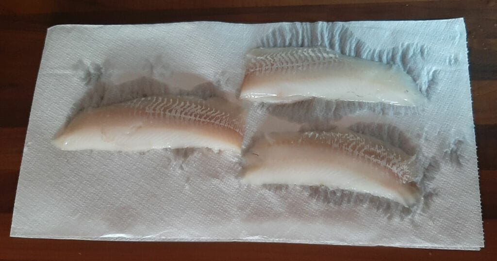 Filets de merlan au four. Une recette de poisson d'Atlantique.