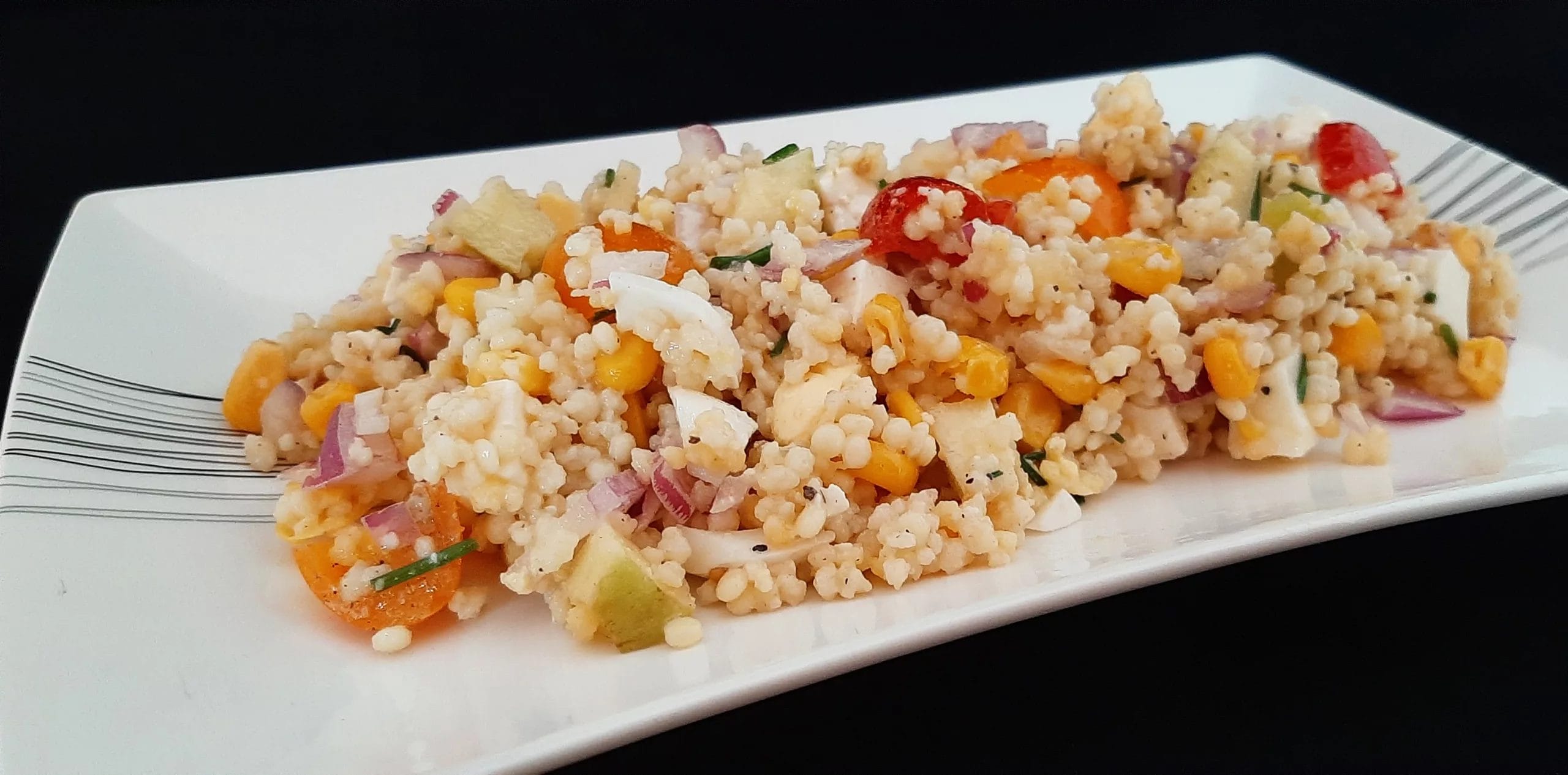 Salade de perles de blé et maïs : une recette facile et savoureuse